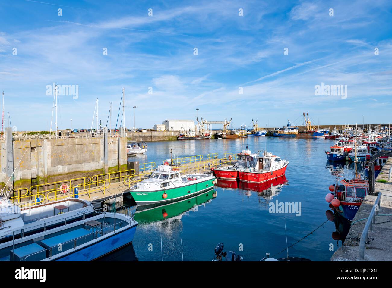Boats moored in Kilmore Quay harbour in southern Ireland Stock Photo ...