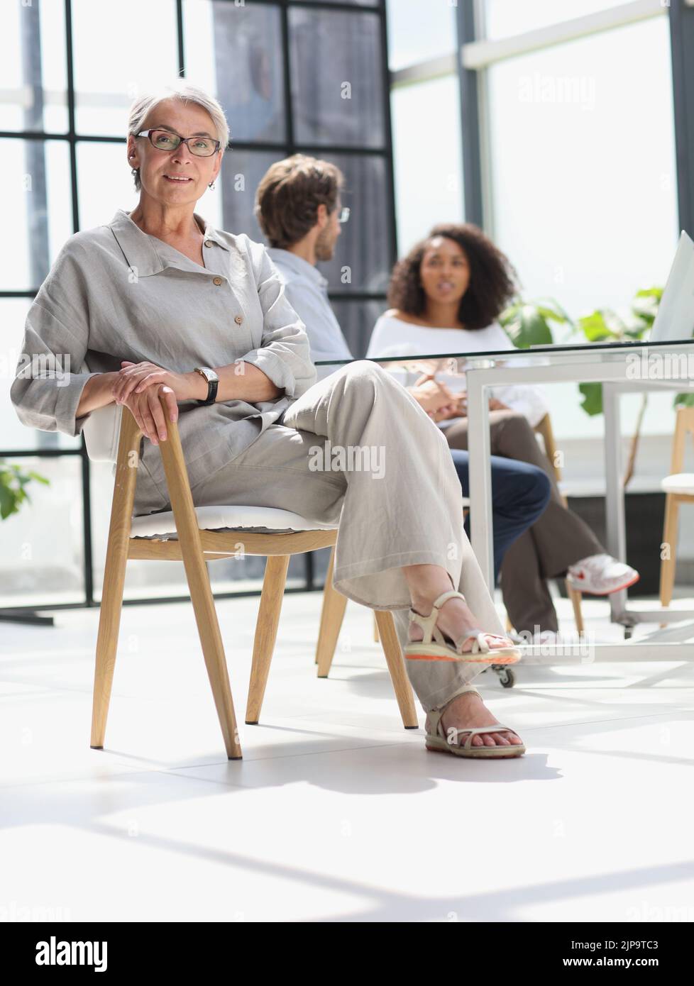 Mature accountant sitting table hi-res stock photography and images - Alamy