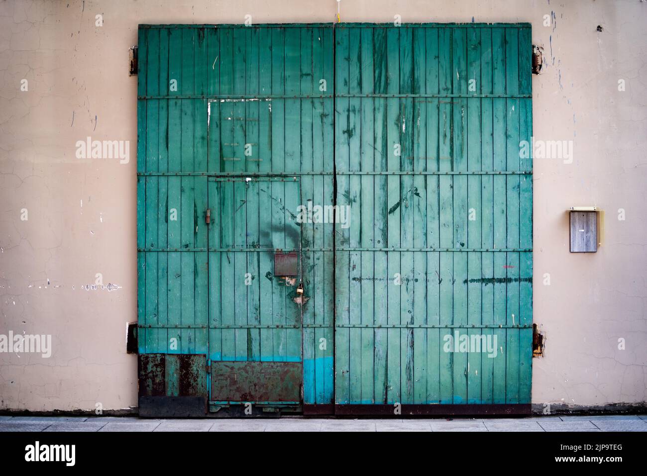 Set of obsolete worn out wear old fashion car garage green wooden gates ...