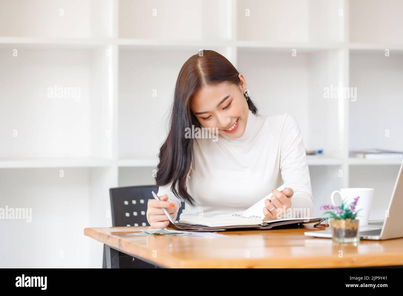 Lifestyle concept, Beautiful asian woman feel relaxing while studying ...