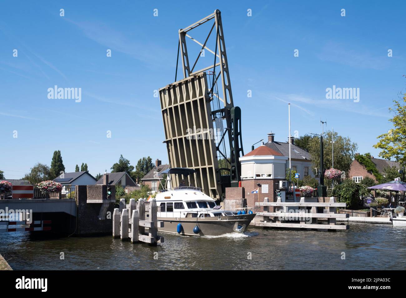 Boat sails on the 'Oude Rijn' (Old Rhine) river under the opened steel ...