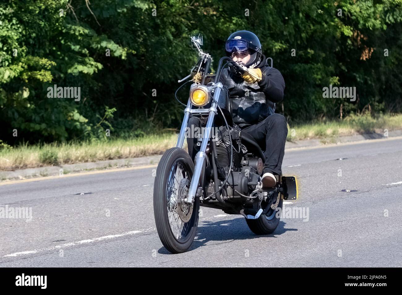Man riding harley davidson motorcycle hi-res stock photography and ...