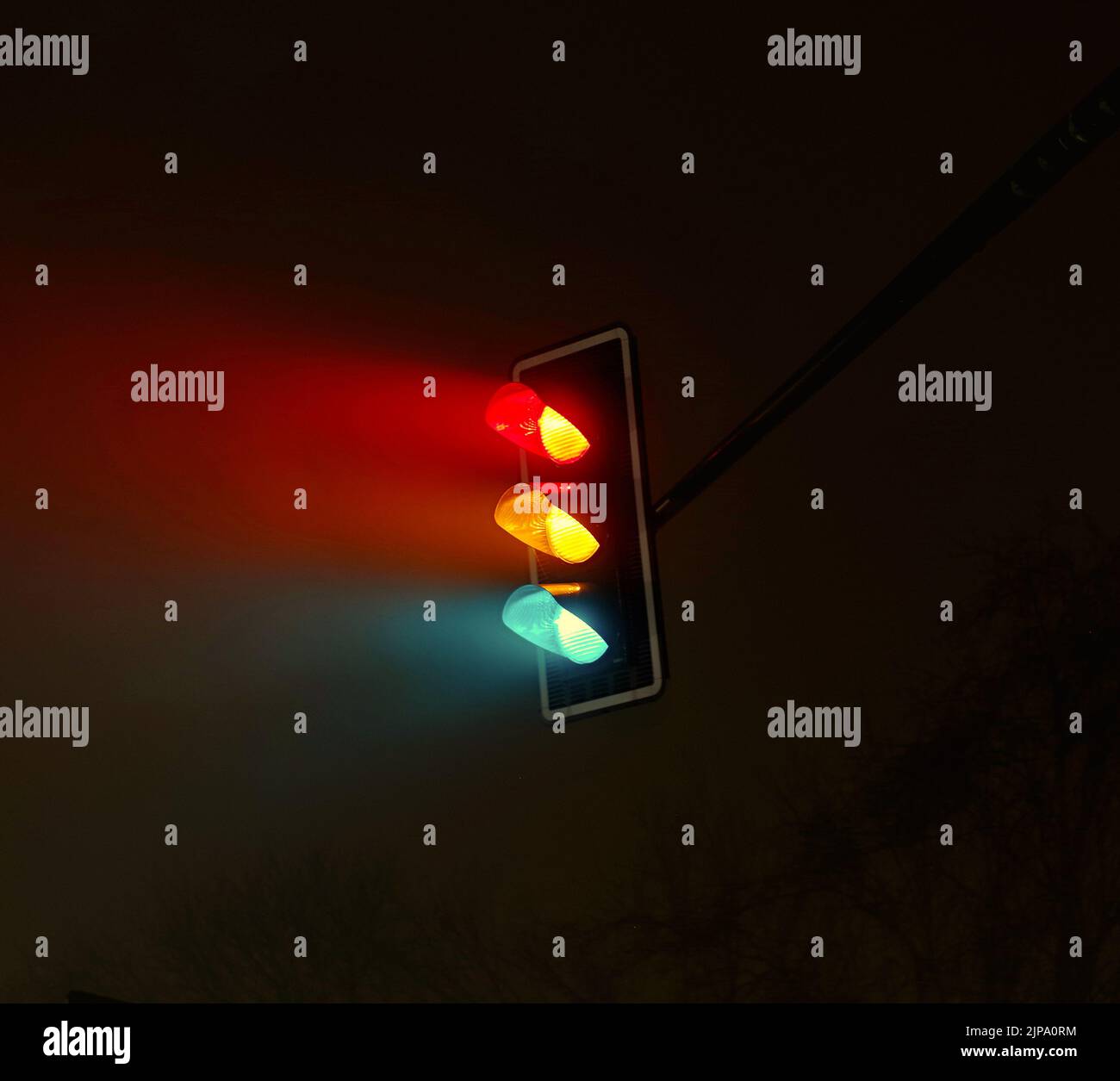 Red Orange Green Lights on the Crossroad Stock Photo - Alamy