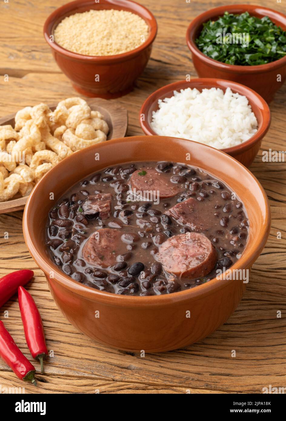 Typical brazilian feijoada with rice, kale, farofa and cracklings Stock ...