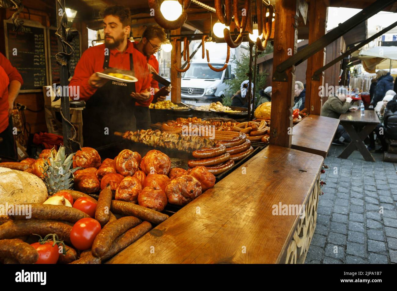 A stand with cold cuts and meat dishes at the Christmas market in ...