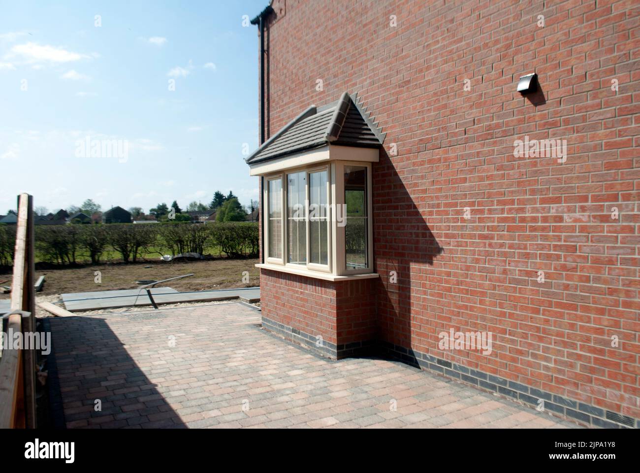 Wall between and windows of newly constructed houses building site ...