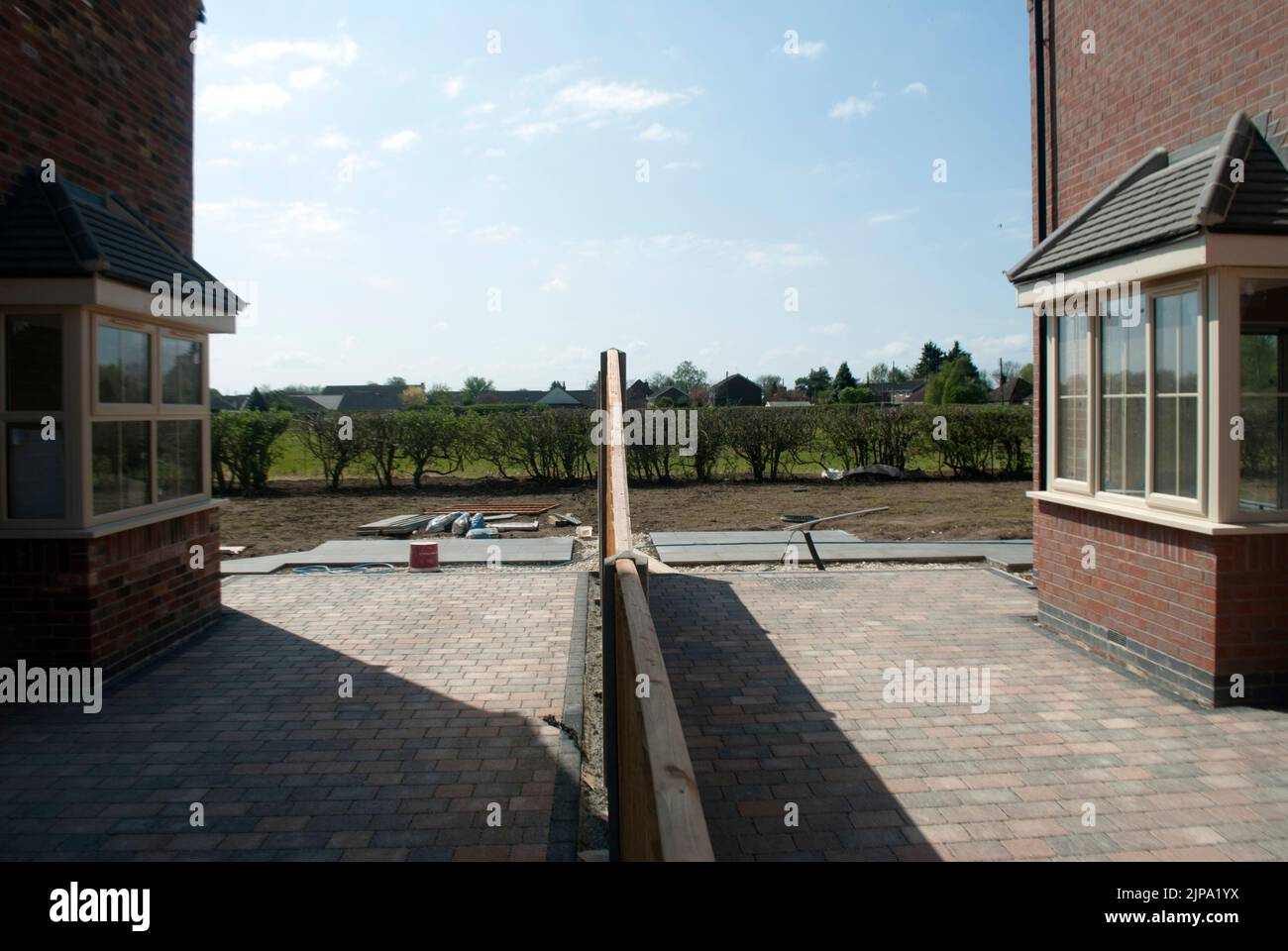 Wall between and windows of newly constructed houses building site ...