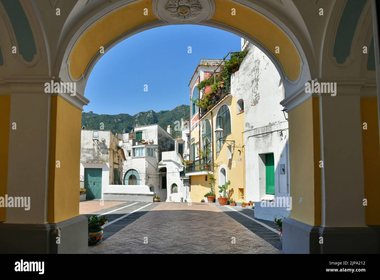 Houses of the village of Albori seen from the arch of a church, in the ...