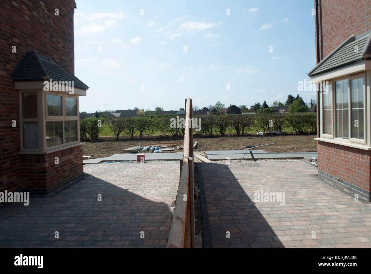 Wall between and windows of newly constructed houses building site ...