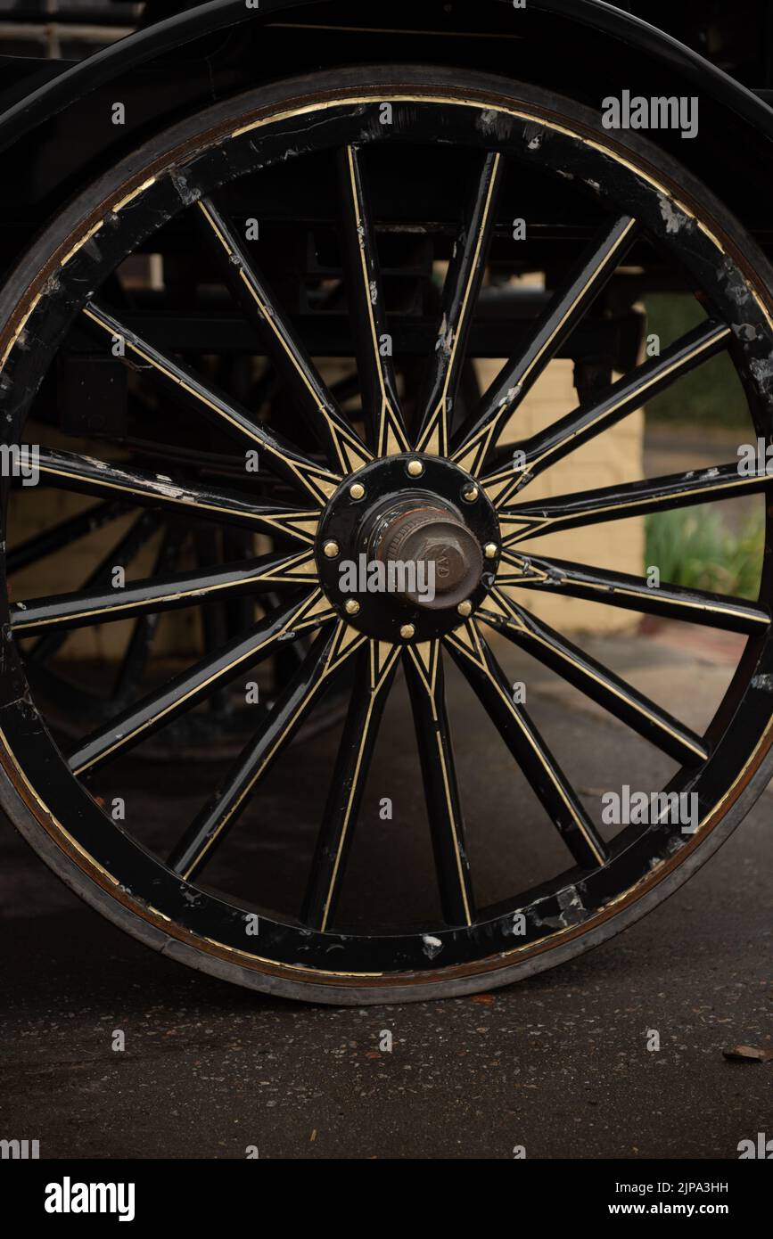 A vertical closuep shot of a wheel of a vintage carriage Stock Photo ...