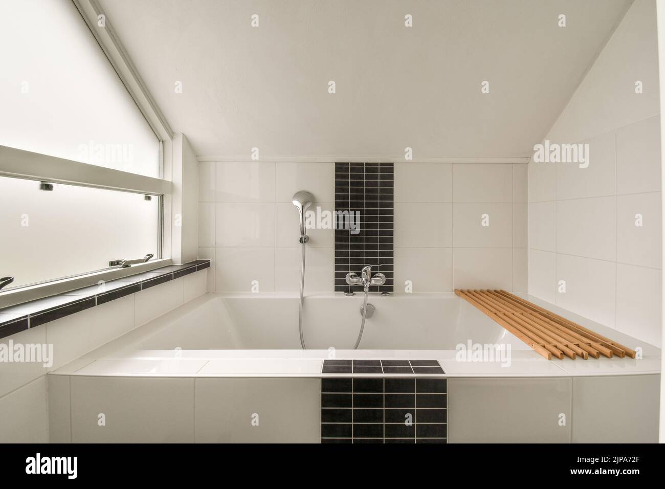 Modern home interior design of white bathroom with open bathtub and ...