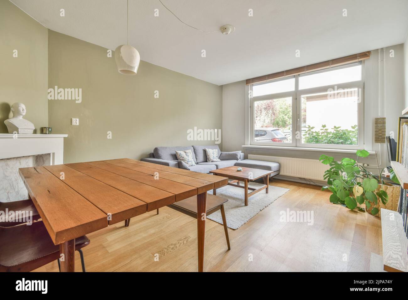 Simple expensive interior of living room with carpet and beige sofa ...