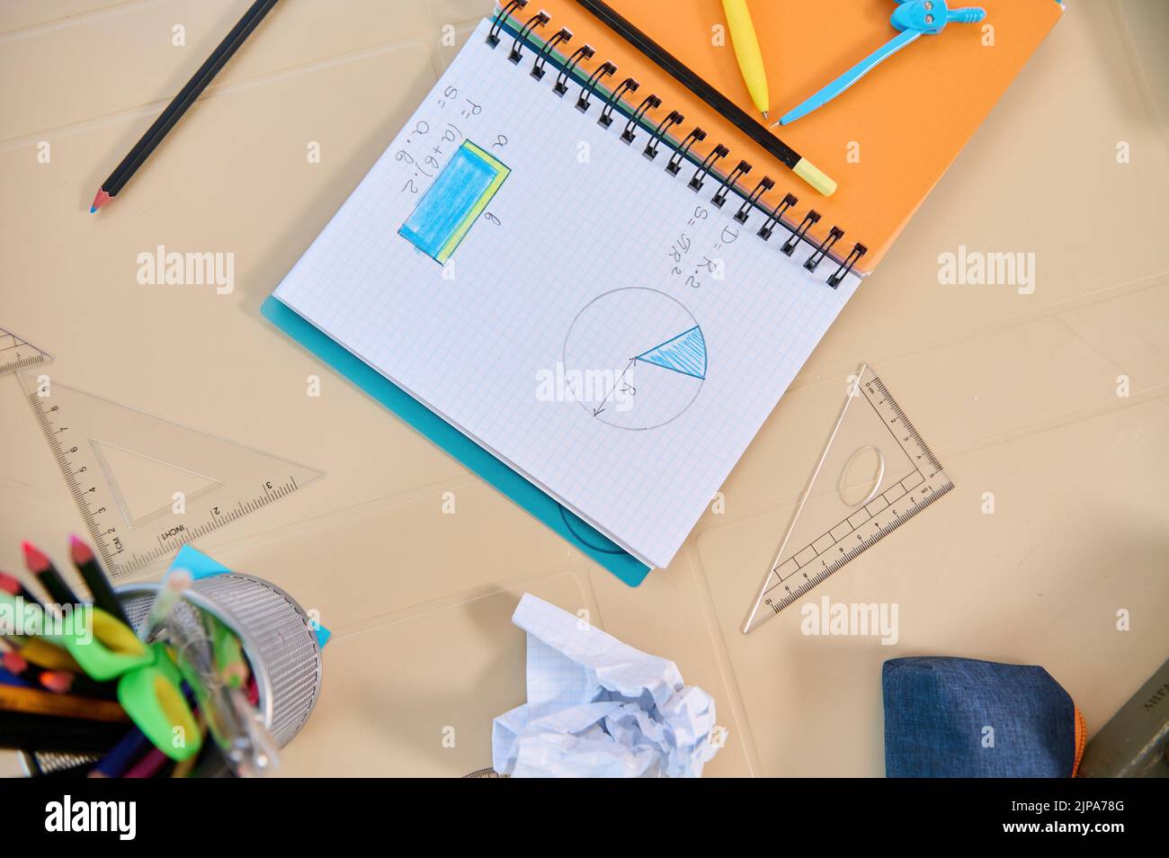 Flat lay of a copybook with geometry examples for solving in primary ...