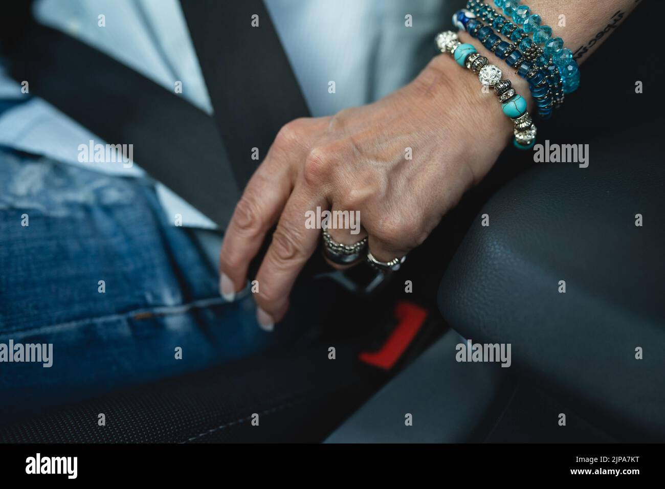 One woman holding belt hi-res stock photography and images - Alamy