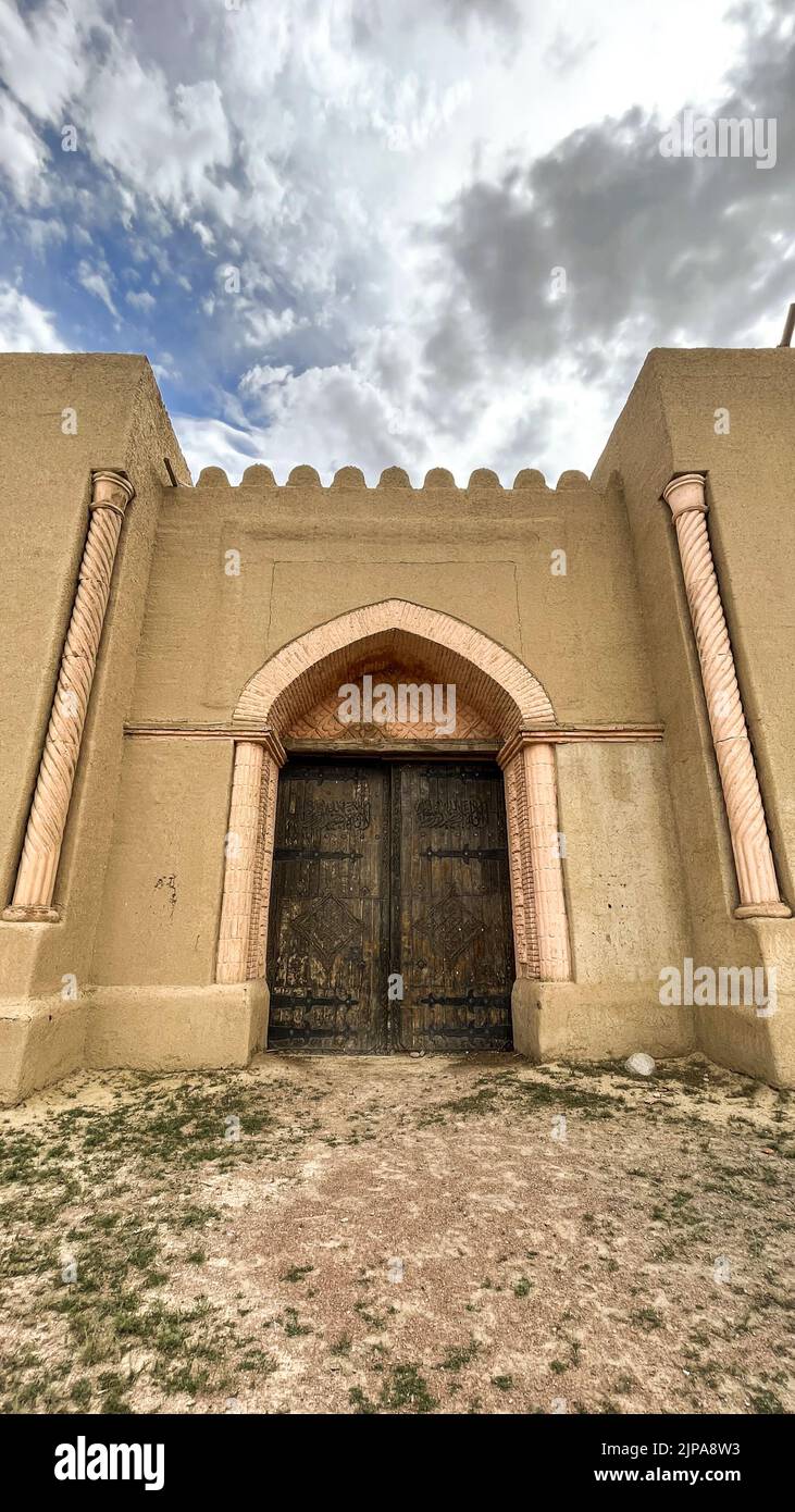 the gates of an ancient fortress in the desert Stock Photo - Alamy