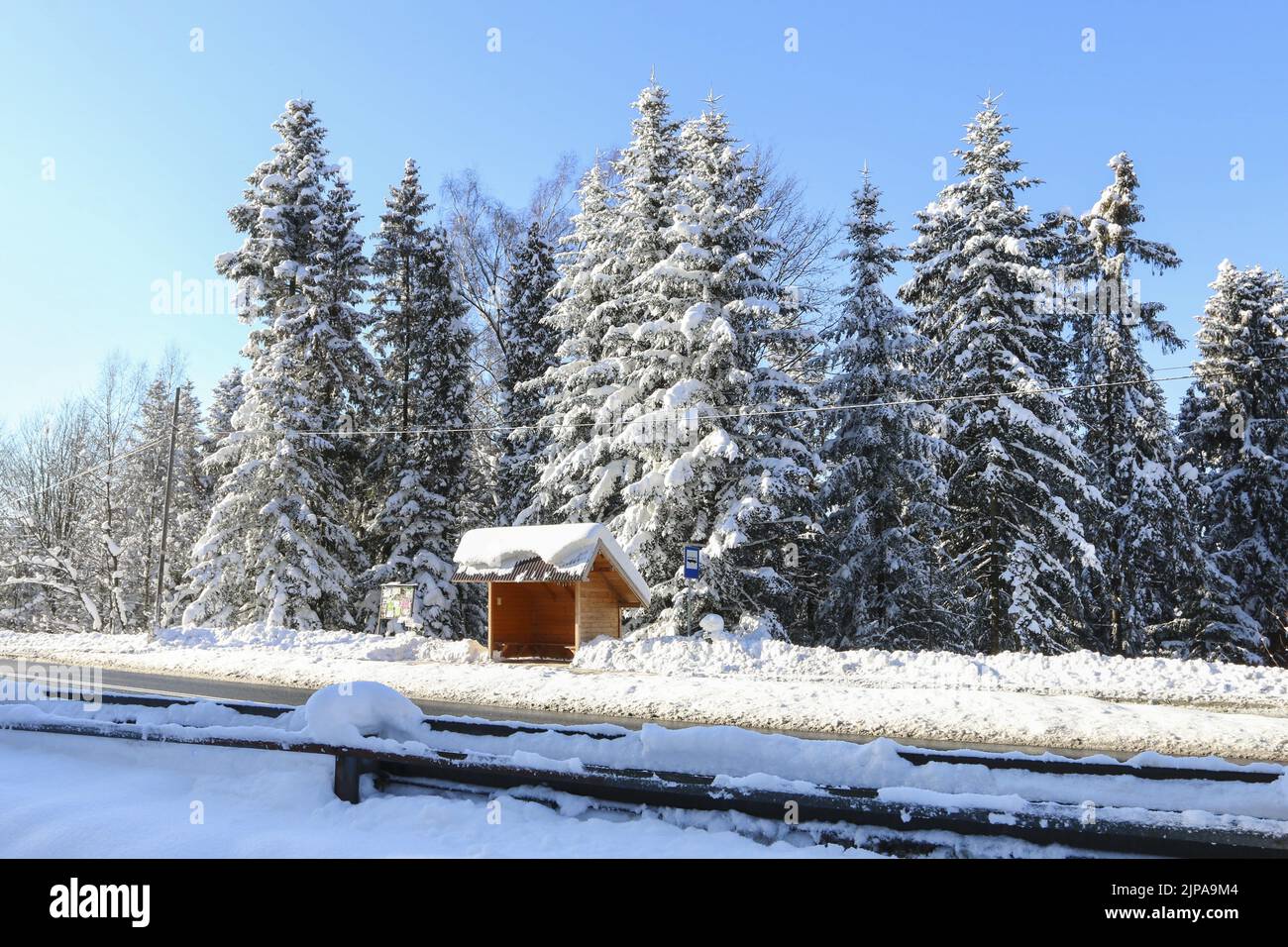 Vintage bus stop on a country road during the winter Stock Photo - Alamy