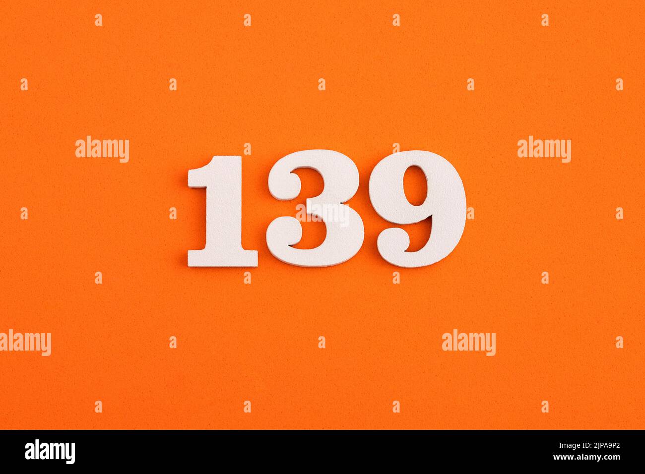 Number 139 - On orange foam rubber background Stock Photo - Alamy