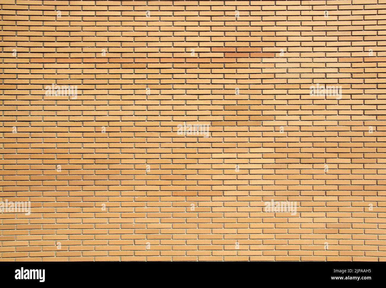a sunlit brick wall, exterior Stock Photo - Alamy