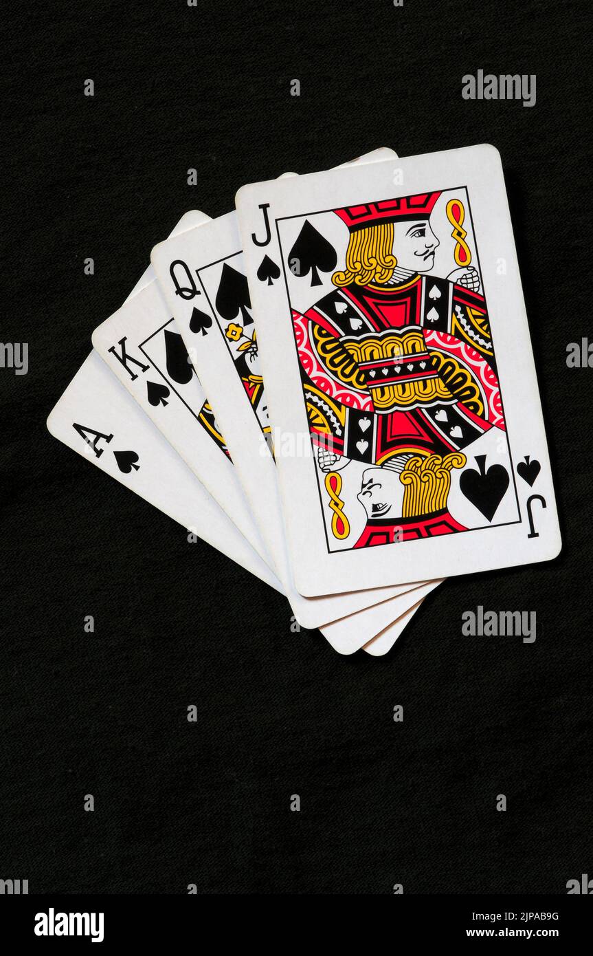 Hand of spades playing cards Stock Photo - Alamy