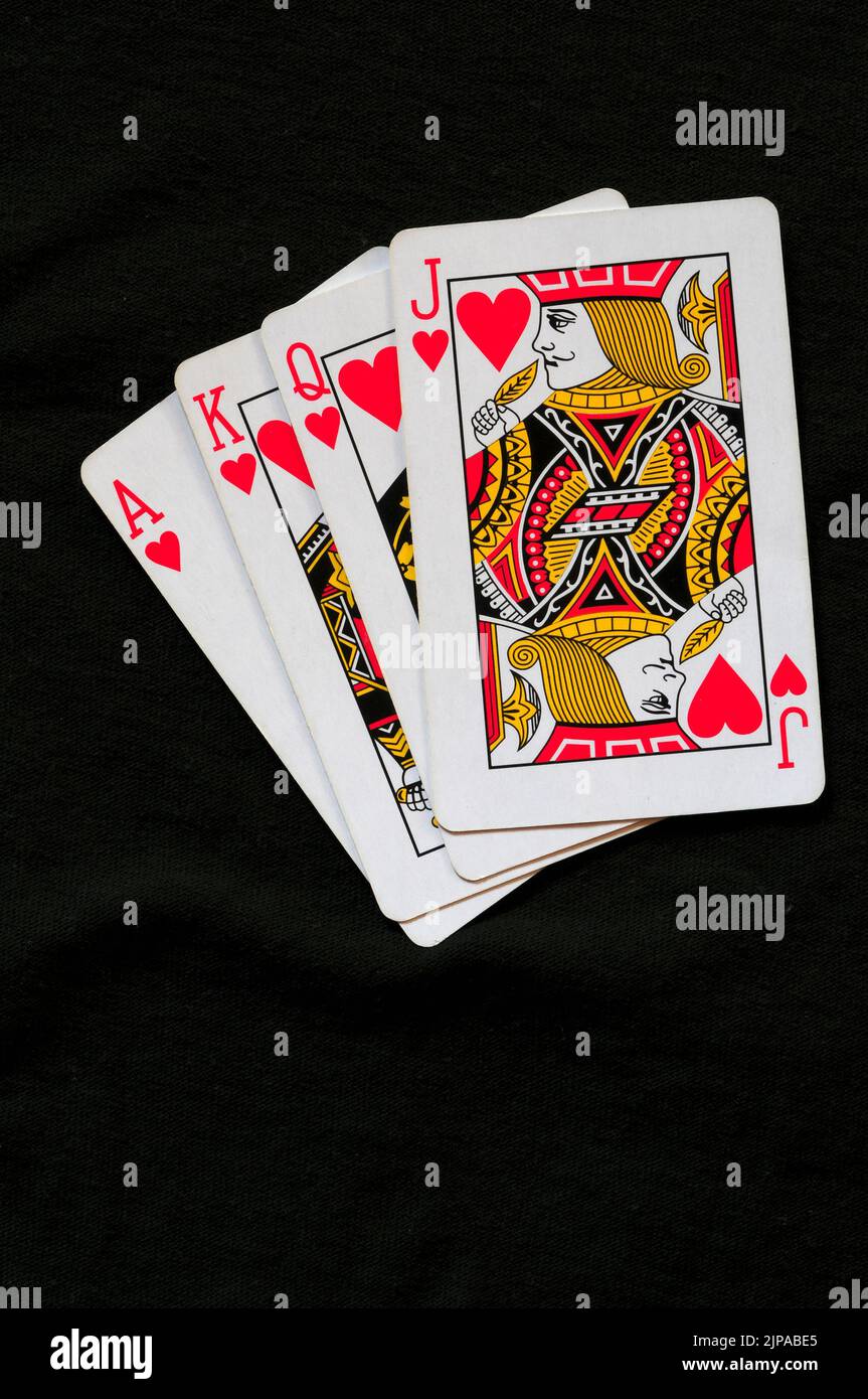 Hand of hearts playing cards Stock Photo - Alamy