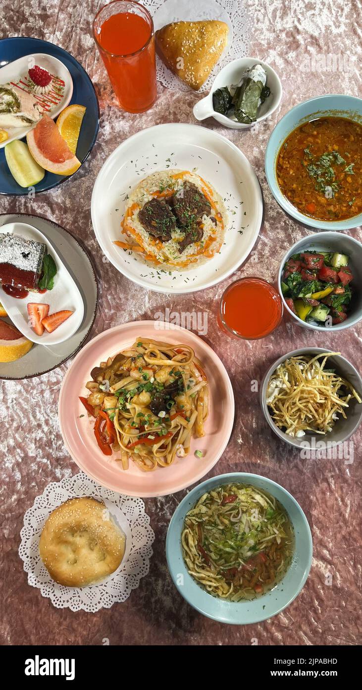lunch in a cafe top view a table full of food Stock Photo - Alamy