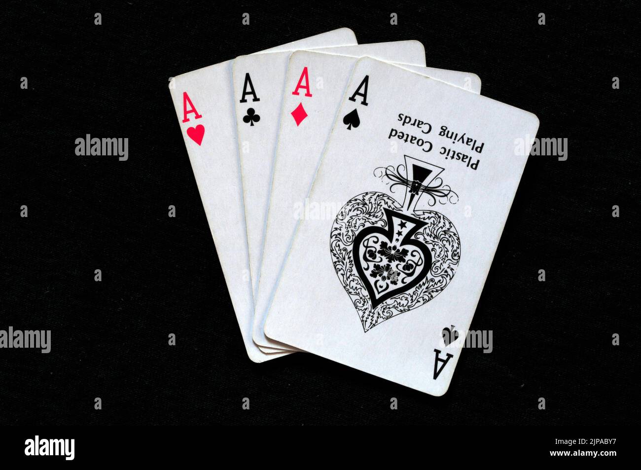 Hand of aces playing cards Stock Photo - Alamy
