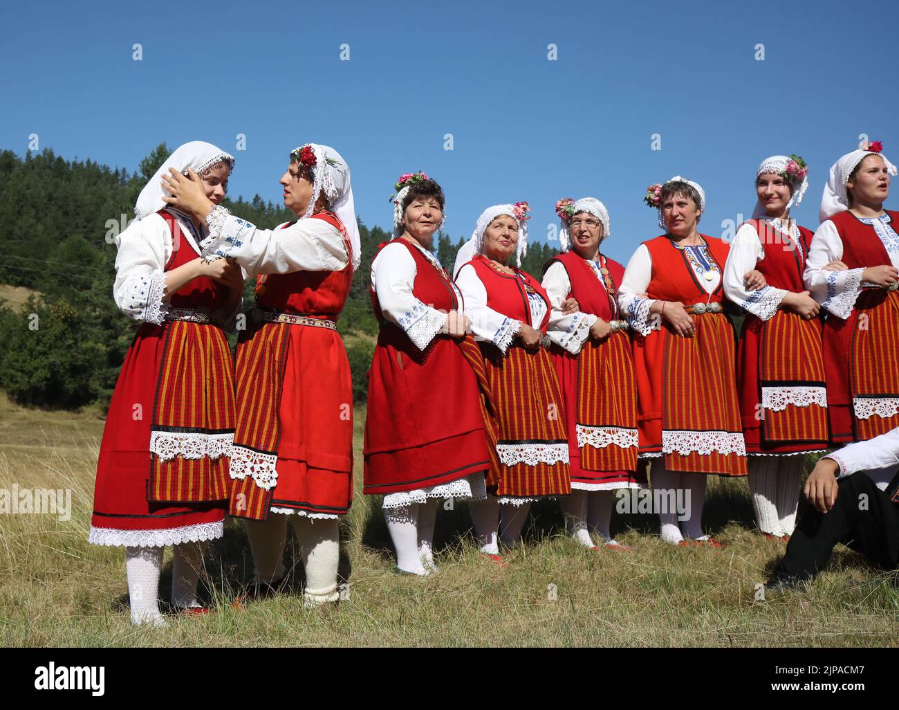 People in traditional folk costume of The National Folklore Fair in ...