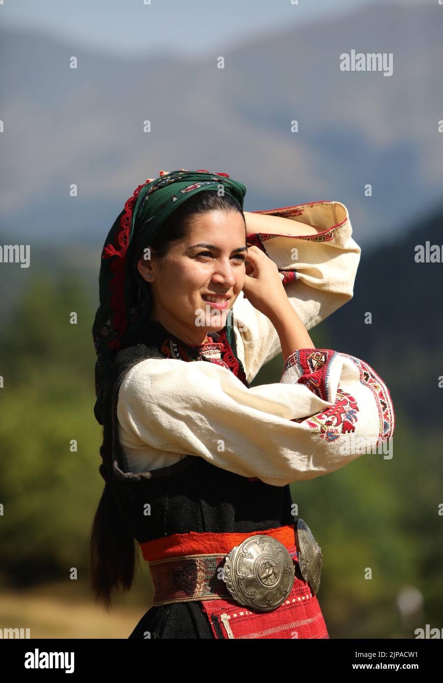 People in traditional folk costume of The National Folklore Fair in ...