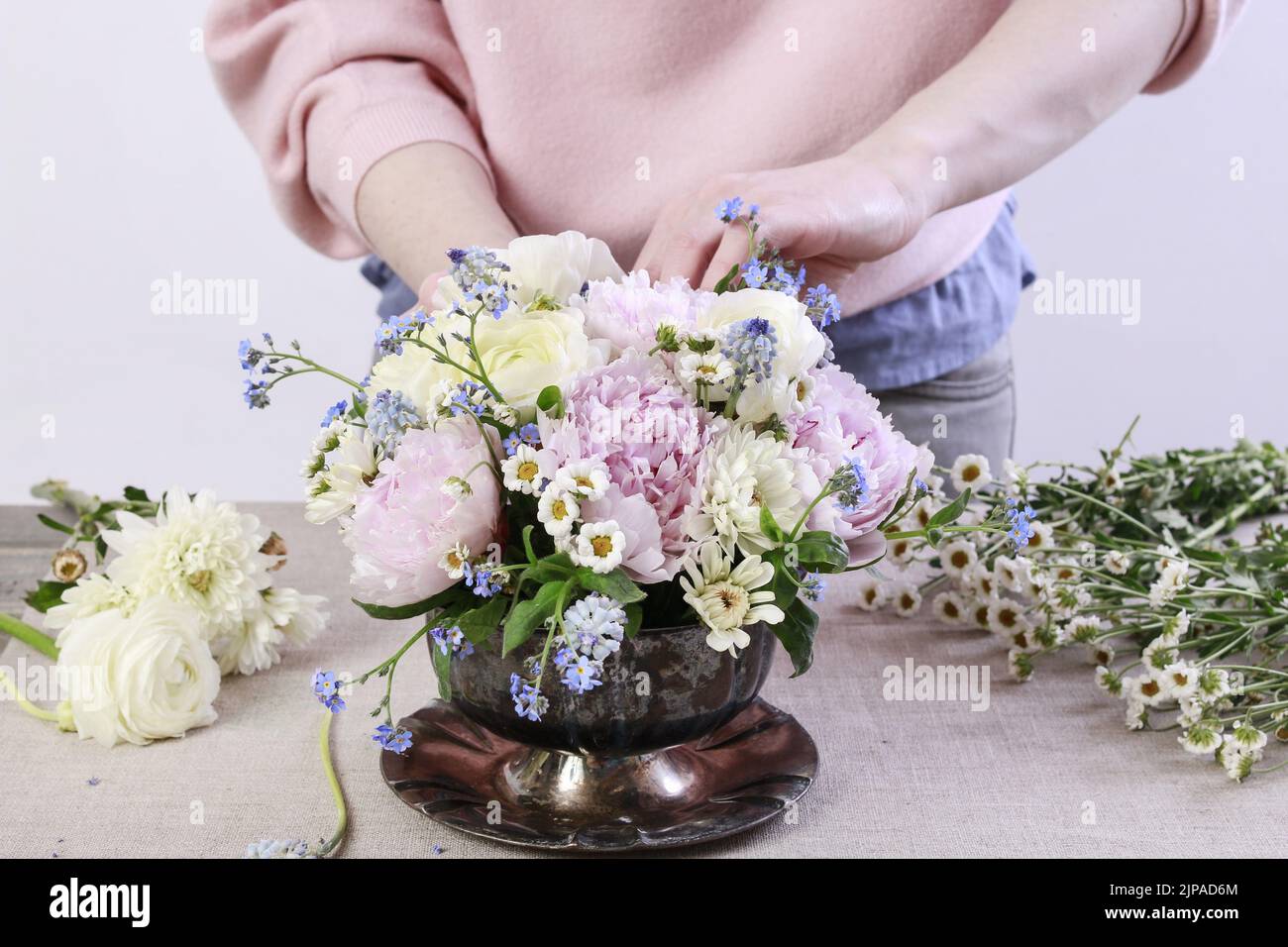 Florist at work: How to make floral arrangement with pink peonies ...