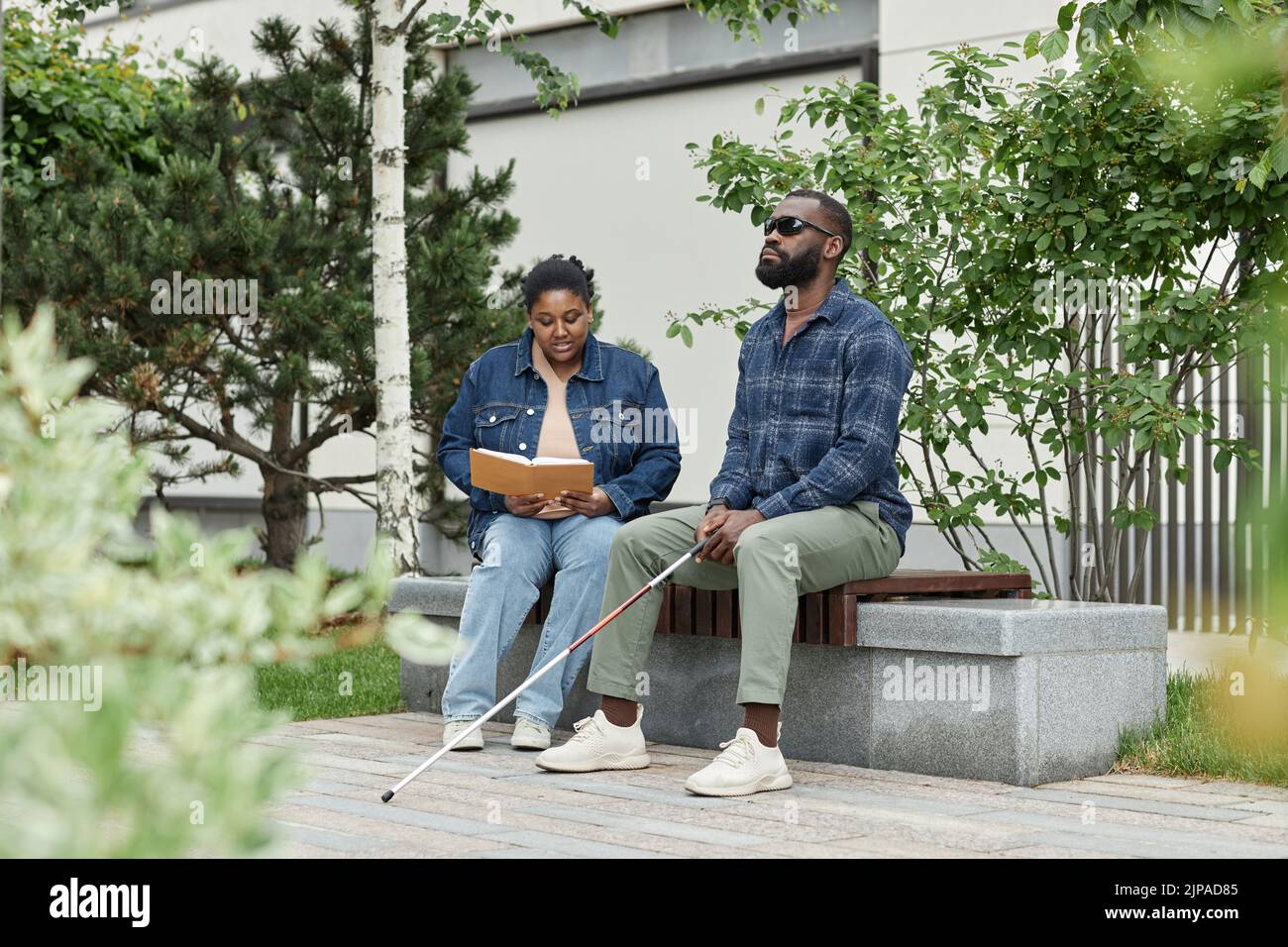 Full length portrait of adult couple with partner with visual ...