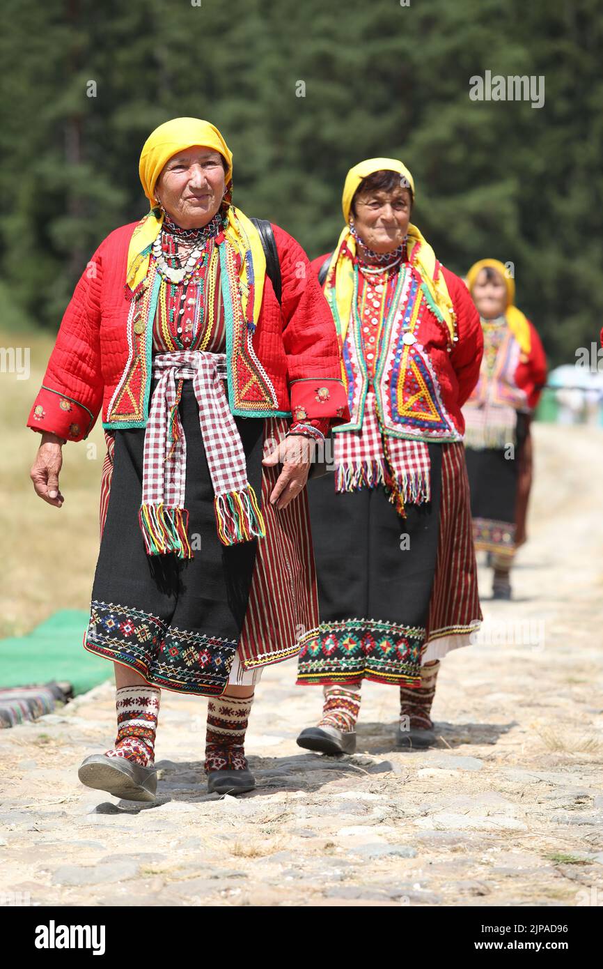 People in traditional folk costume of The National Folklore Fair in ...