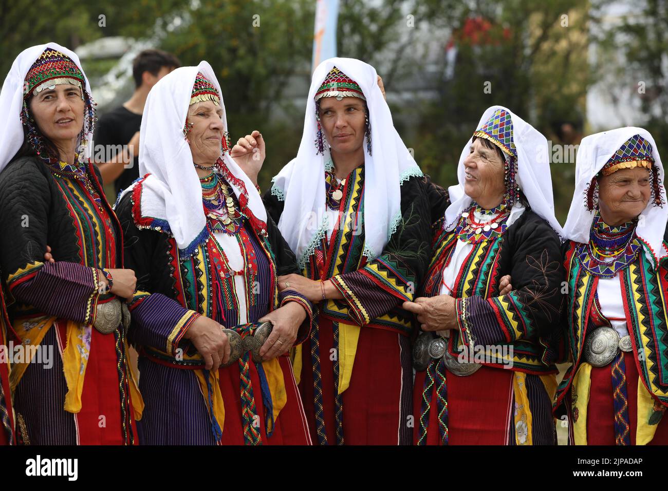 People in traditional folk costume of The National Folklore Fair in ...