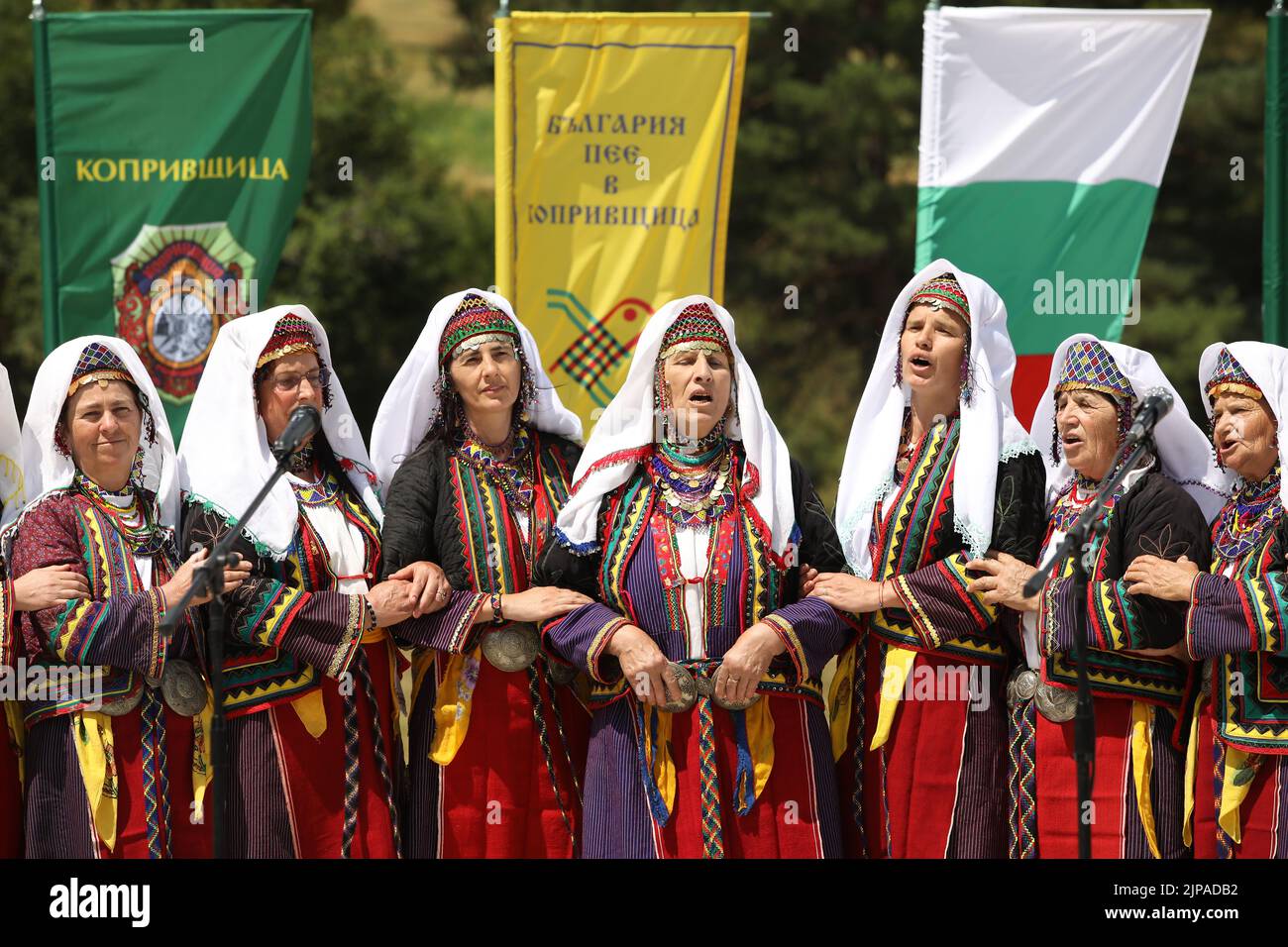 People in traditional folk costume of The National Folklore Fair in ...