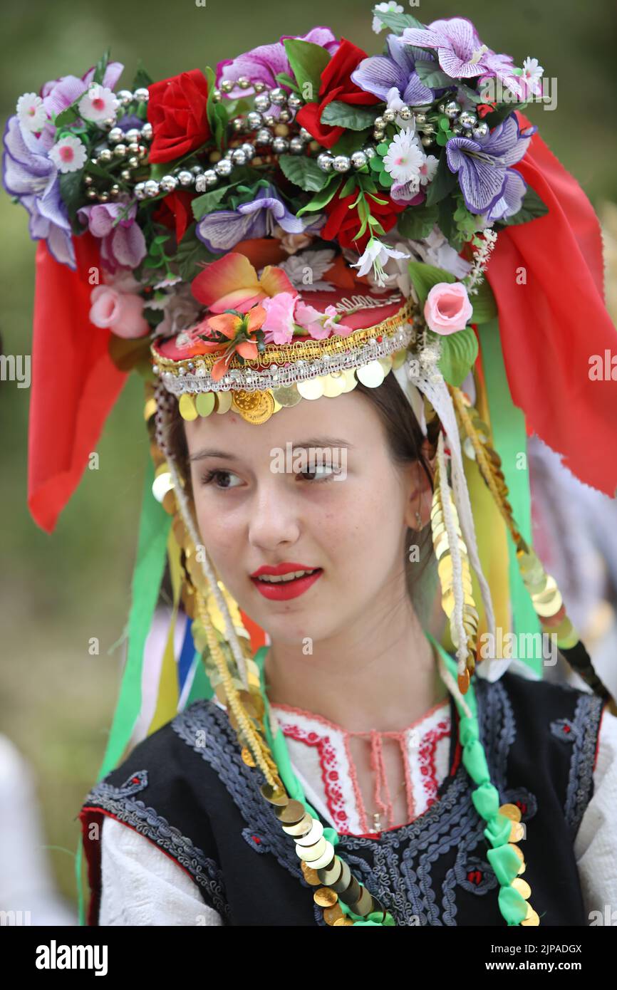 People in traditional folk costume of The National Folklore Fair in ...