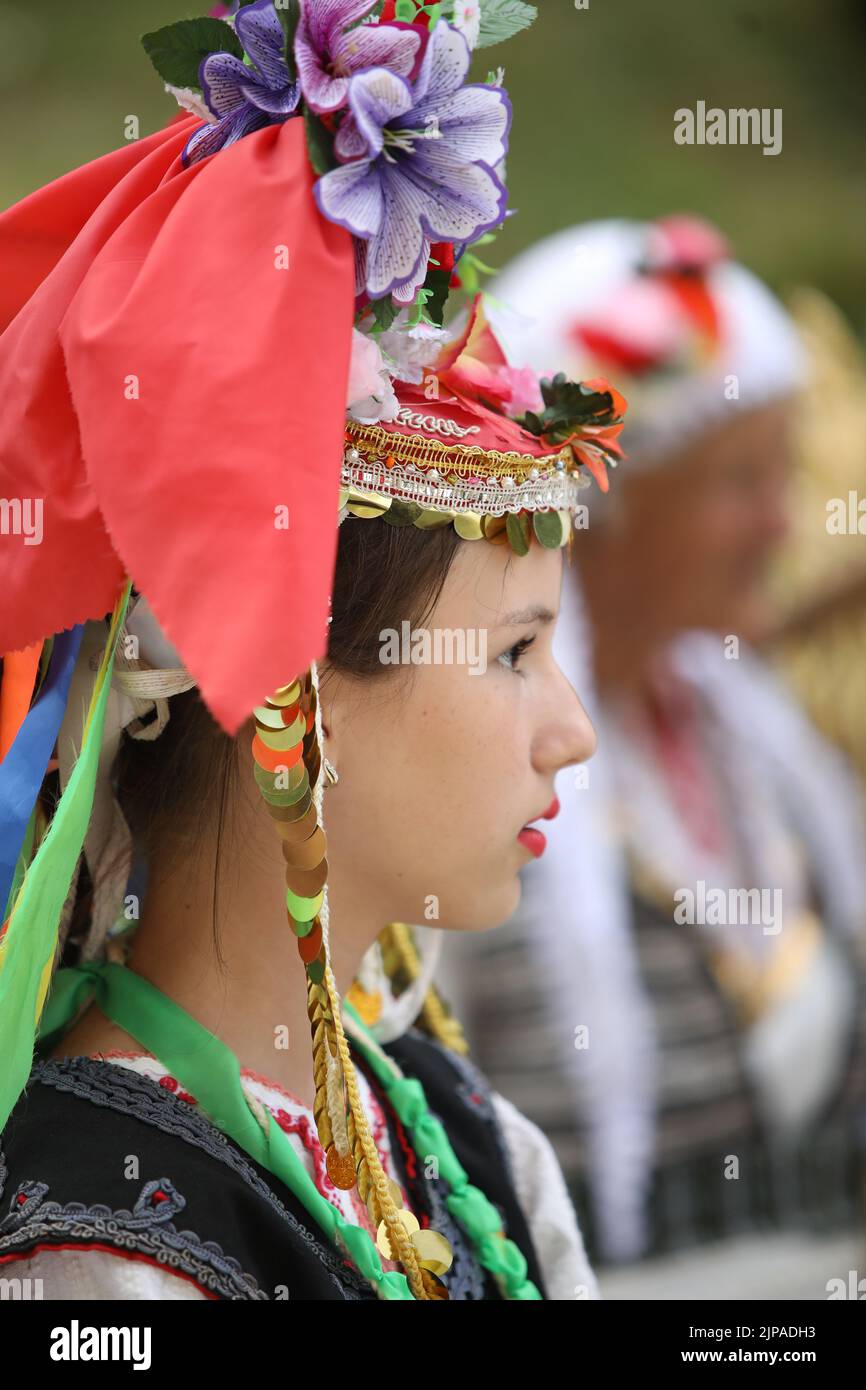 People in traditional folk costume of The National Folklore Fair in ...