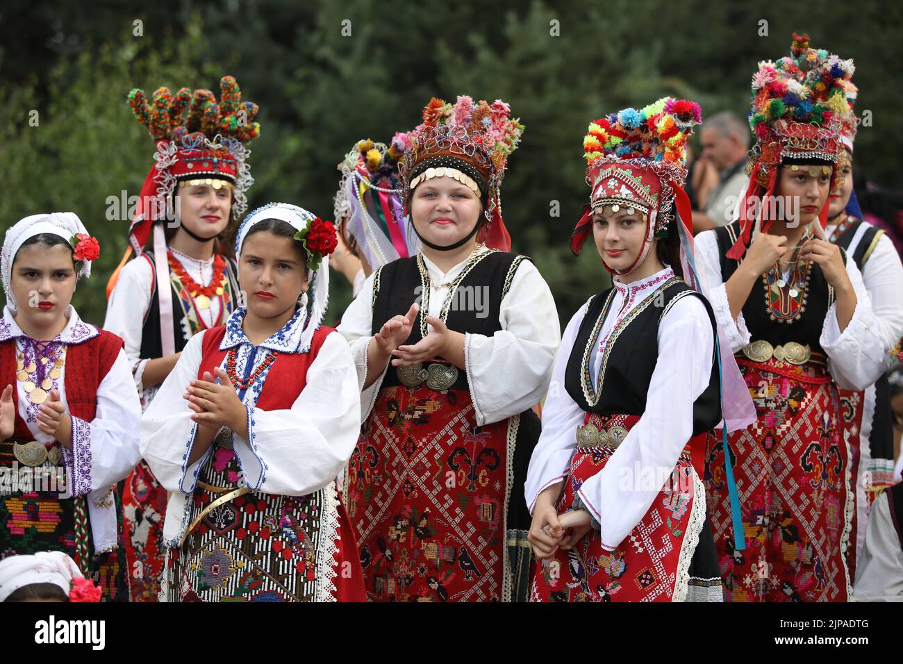 People in traditional folk costume of The National Folklore Fair in ...