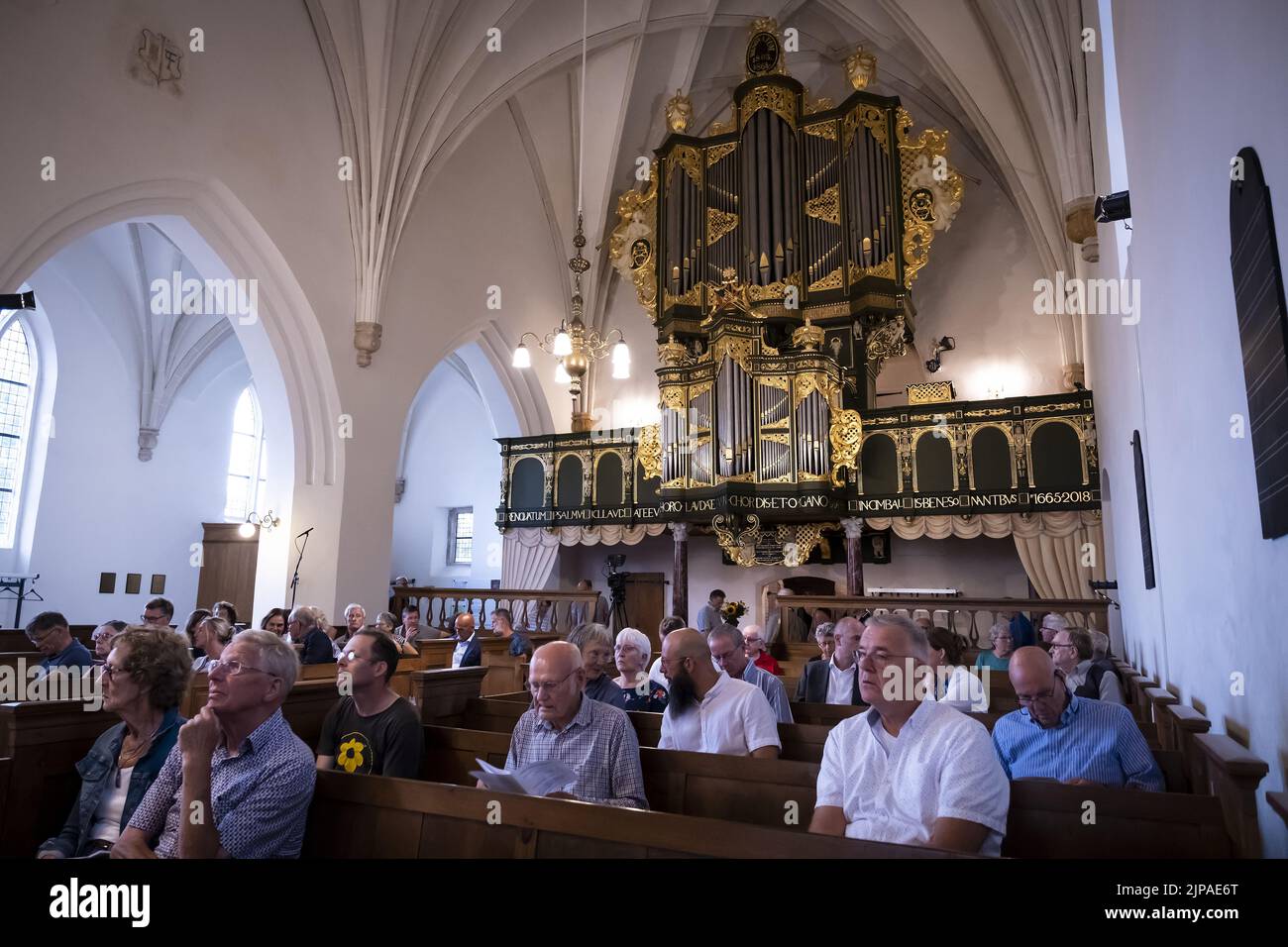 2022-08-16 19:23:20 LOPPERSUM - Churchgoers during a church service ...