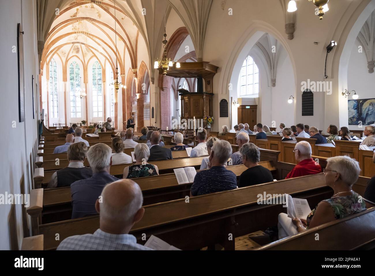 2022-08-16 19:36:54 LOPPERSUM - Churchgoers during a church service ...