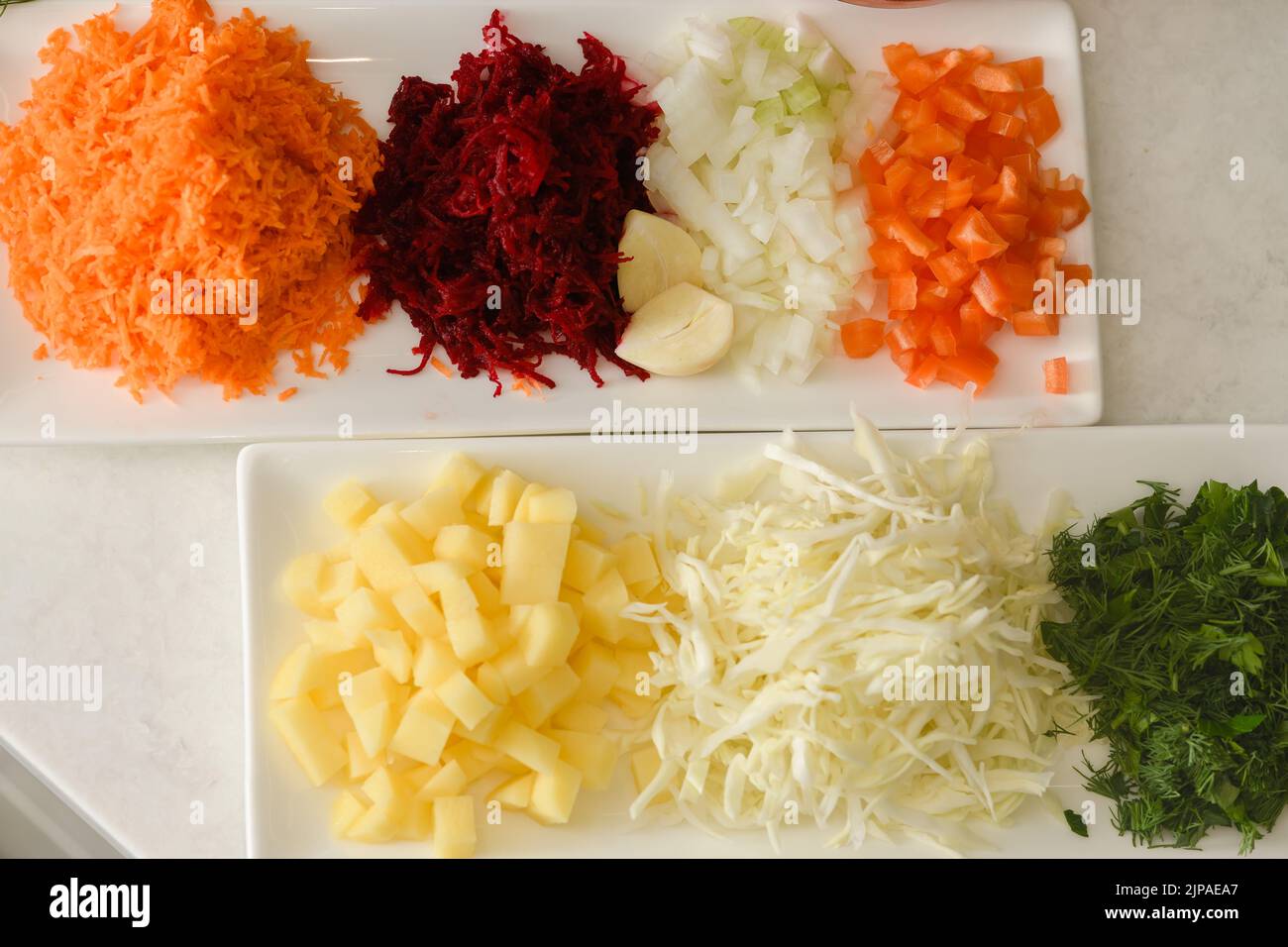 Chopped vegetables for cooking traditional Ukrainian borscht. View from ...