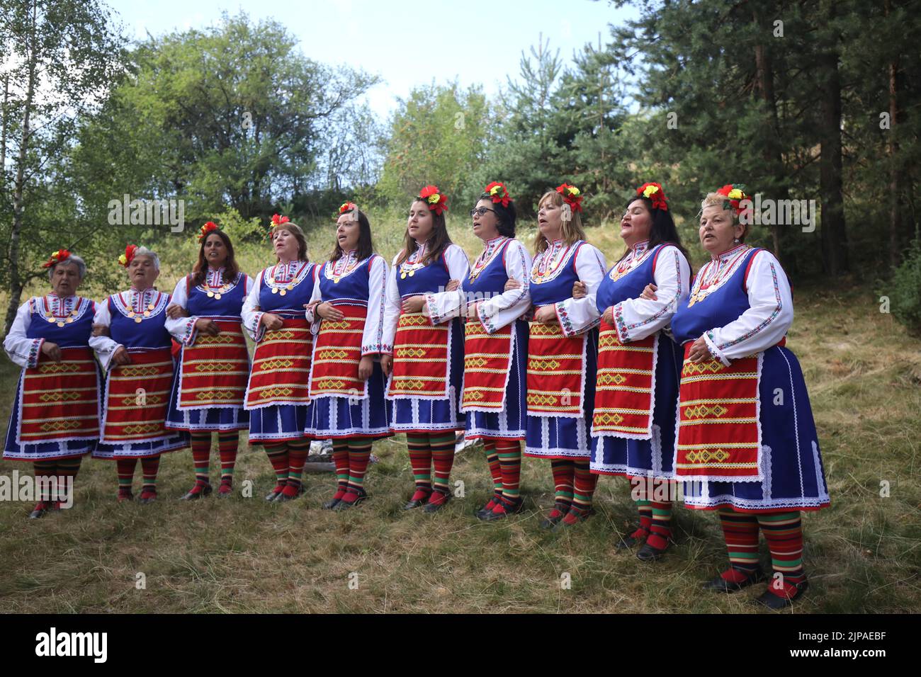 People in traditional folk costume of The National Folklore Fair in ...