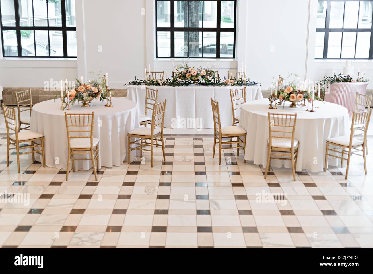 A reception with round tables decorated in a wedding style Stock Photo ...