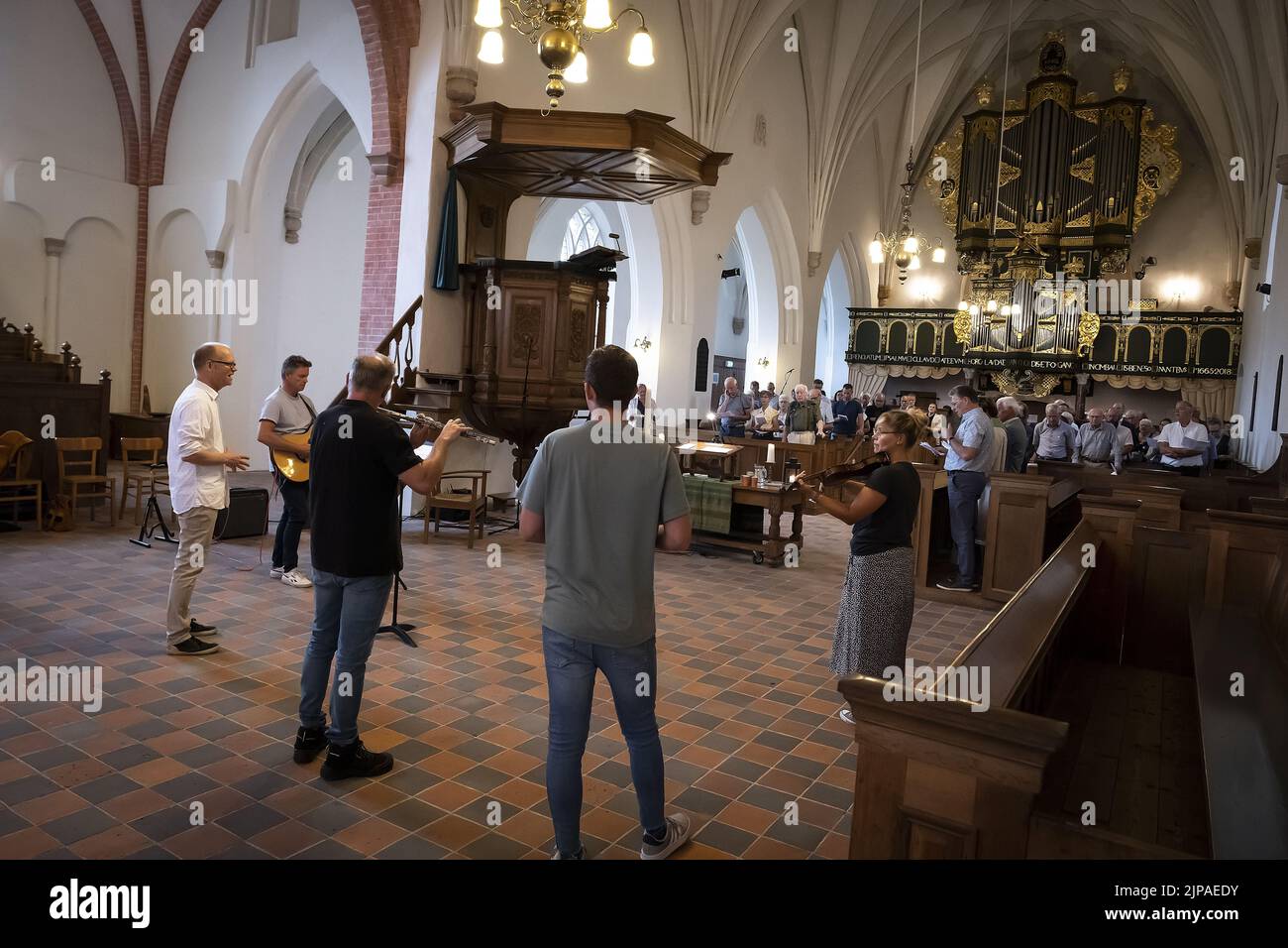2022-08-16 19:53:32 LOPPERSUM - Churchgoers during a church service ...