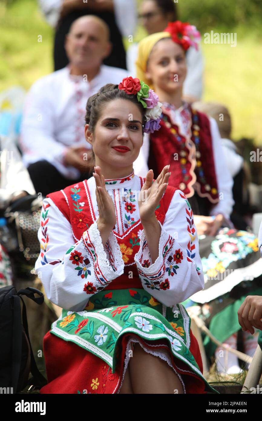 People in traditional folk costume of The National Folklore Fair in ...