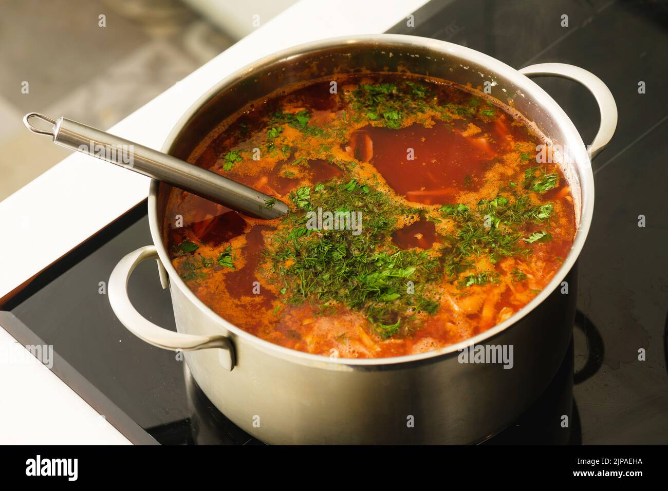 Pot of freshly cooked delicious traditional ukrainian borscht on a ...