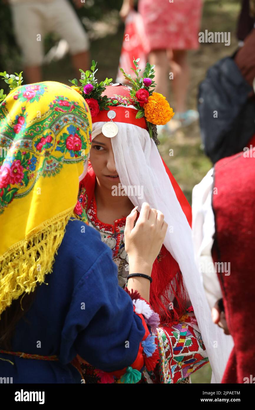 People in traditional folk costume of The National Folklore Fair in ...