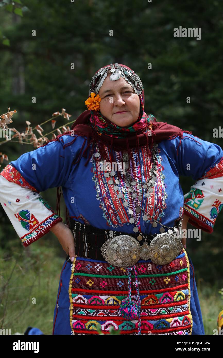 People in traditional folk costume of The National Folklore Fair in ...