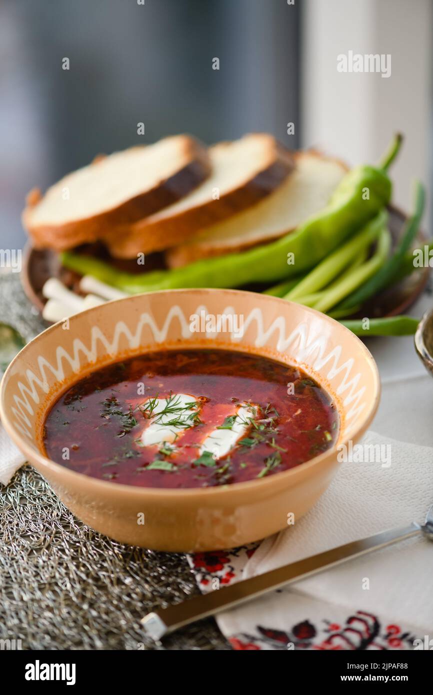 Traditional Ukrainian borscht. Clay Bowl of red beet root soup borsch ...