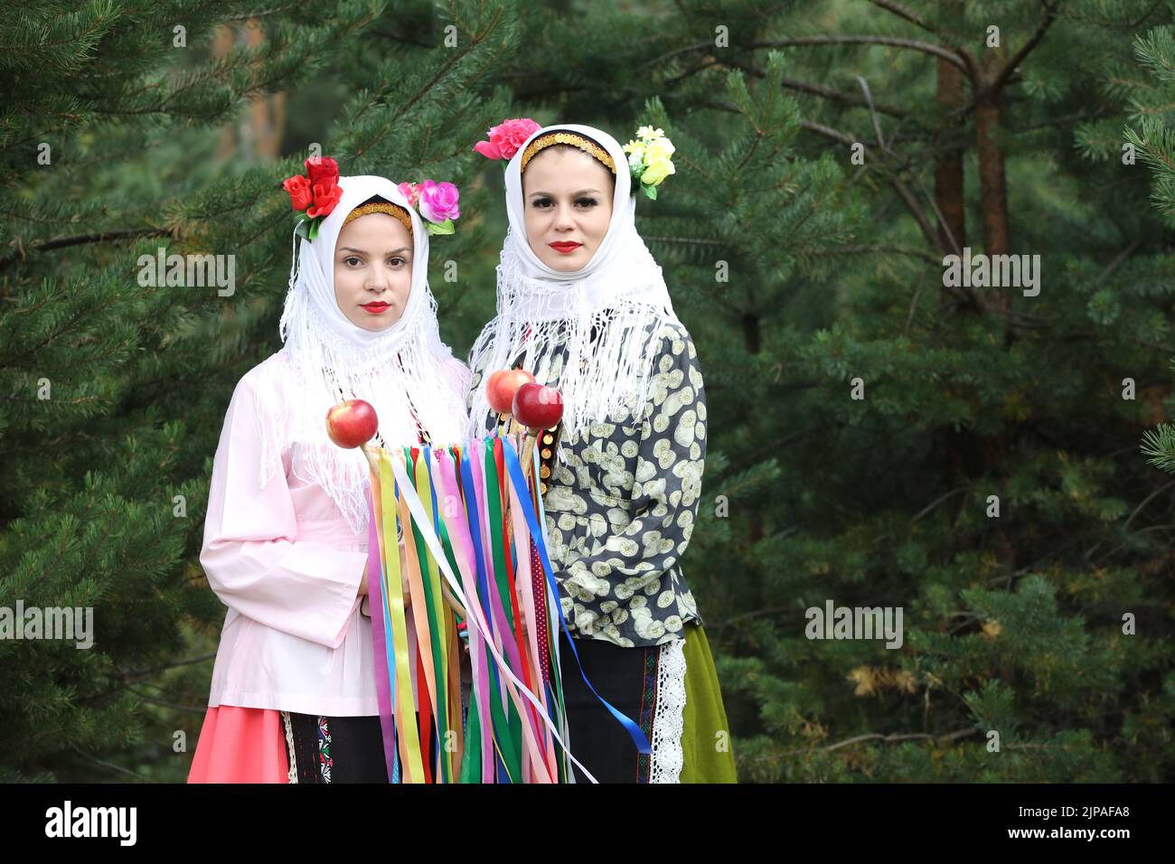 People in traditional folk costume of The National Folklore Fair in ...