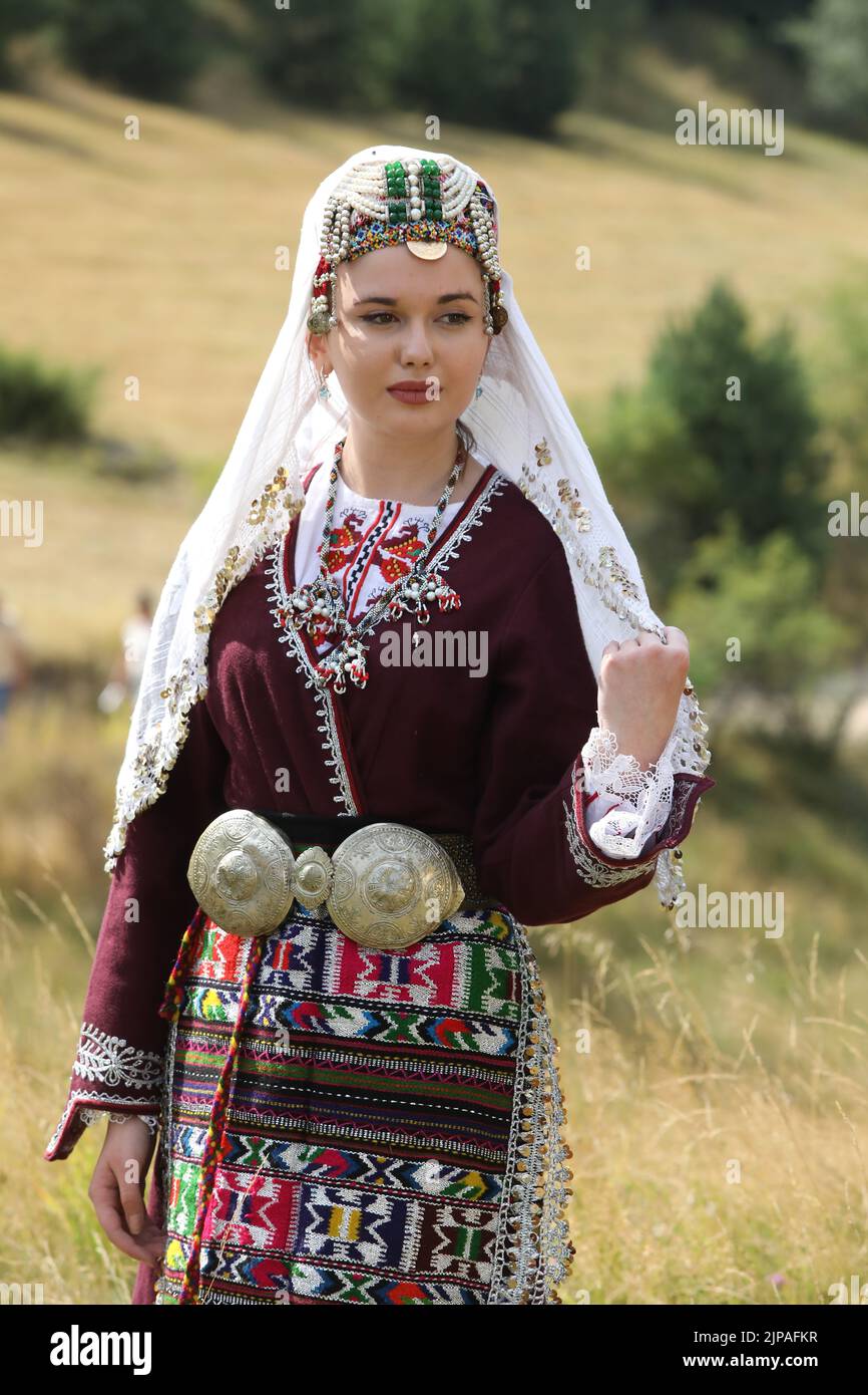 People in traditional folk costume of The National Folklore Fair in ...