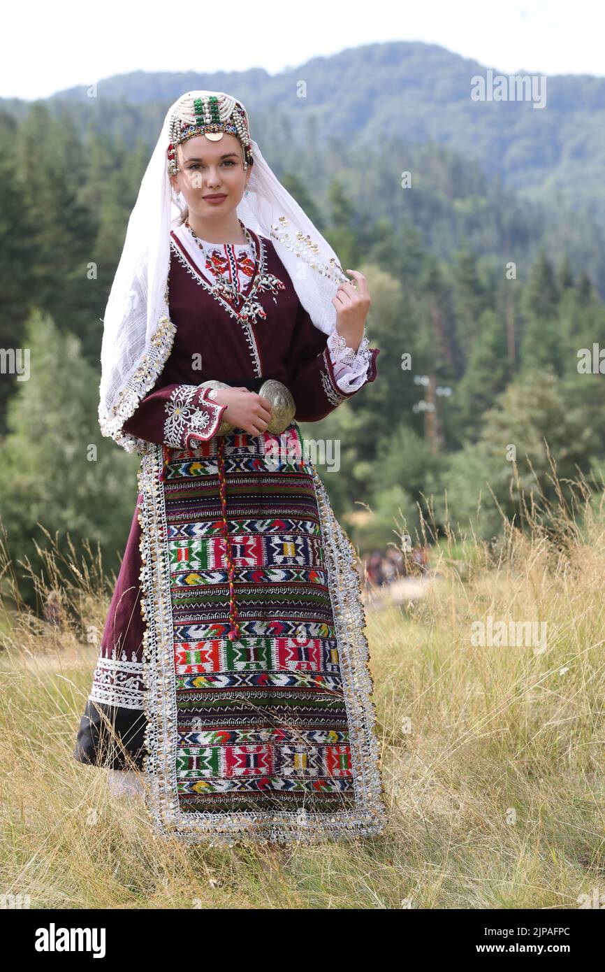 People in traditional folk costume of The National Folklore Fair in ...